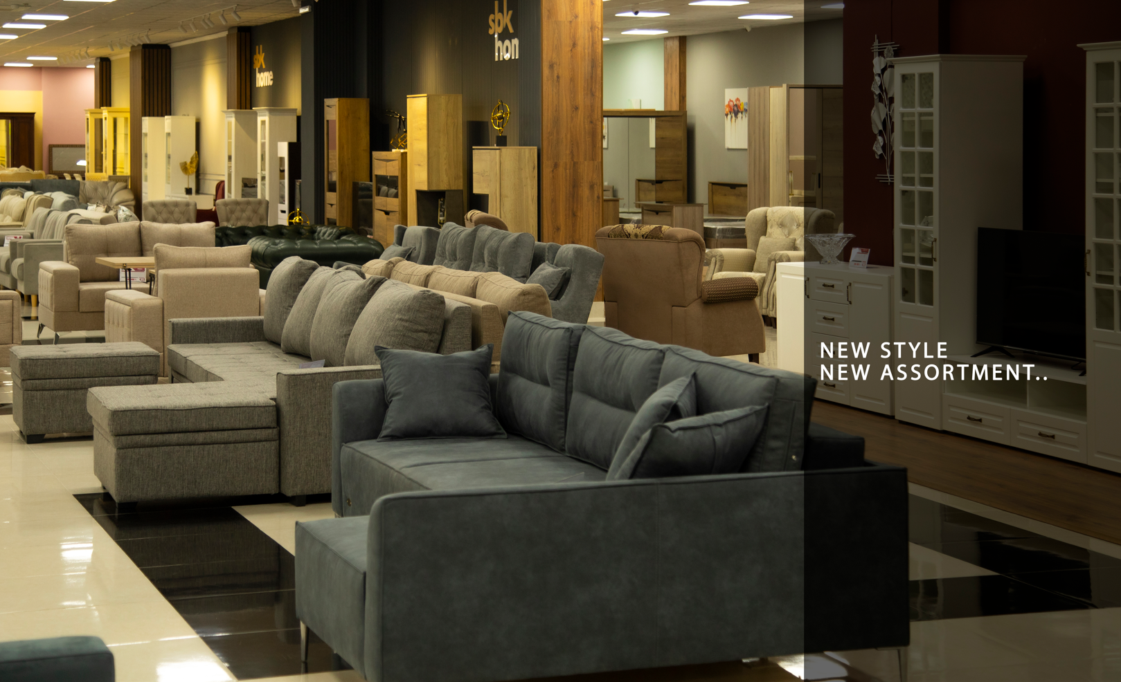 The furniture assortment is placed in the showroom in such a way that ...